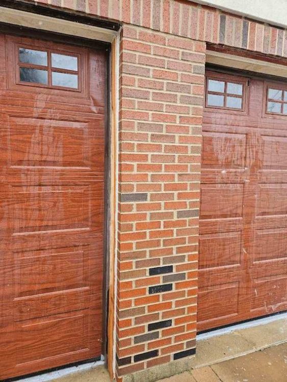 Brick Garage Wall Section Rebuild - Midland Masonry Inc.